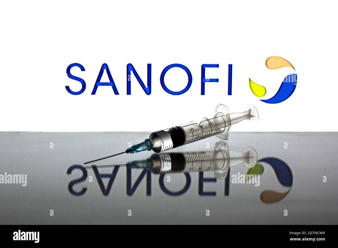 In this photo illustration a medical syringe seen displayed in front of ...