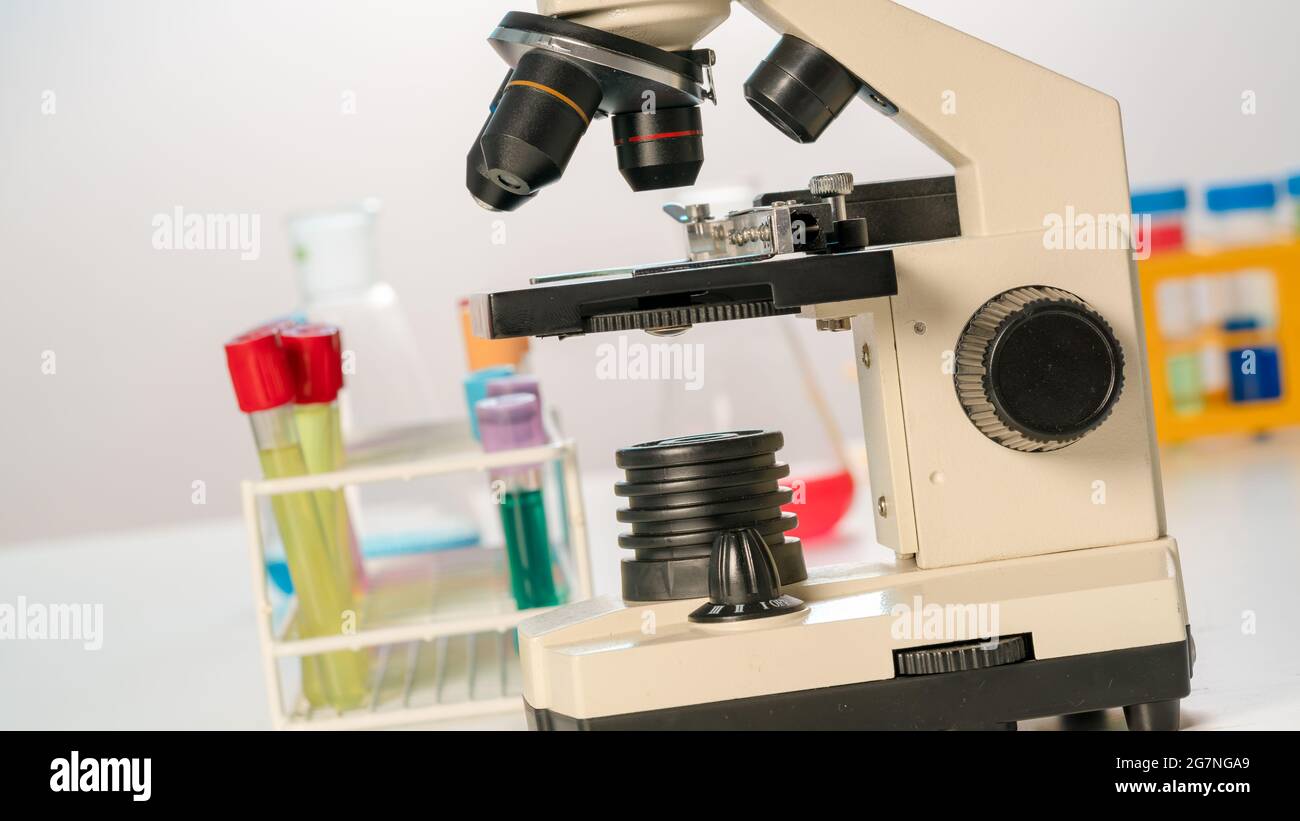 Test tubes and flasks and microscope in a chemical laboratory Stock ...