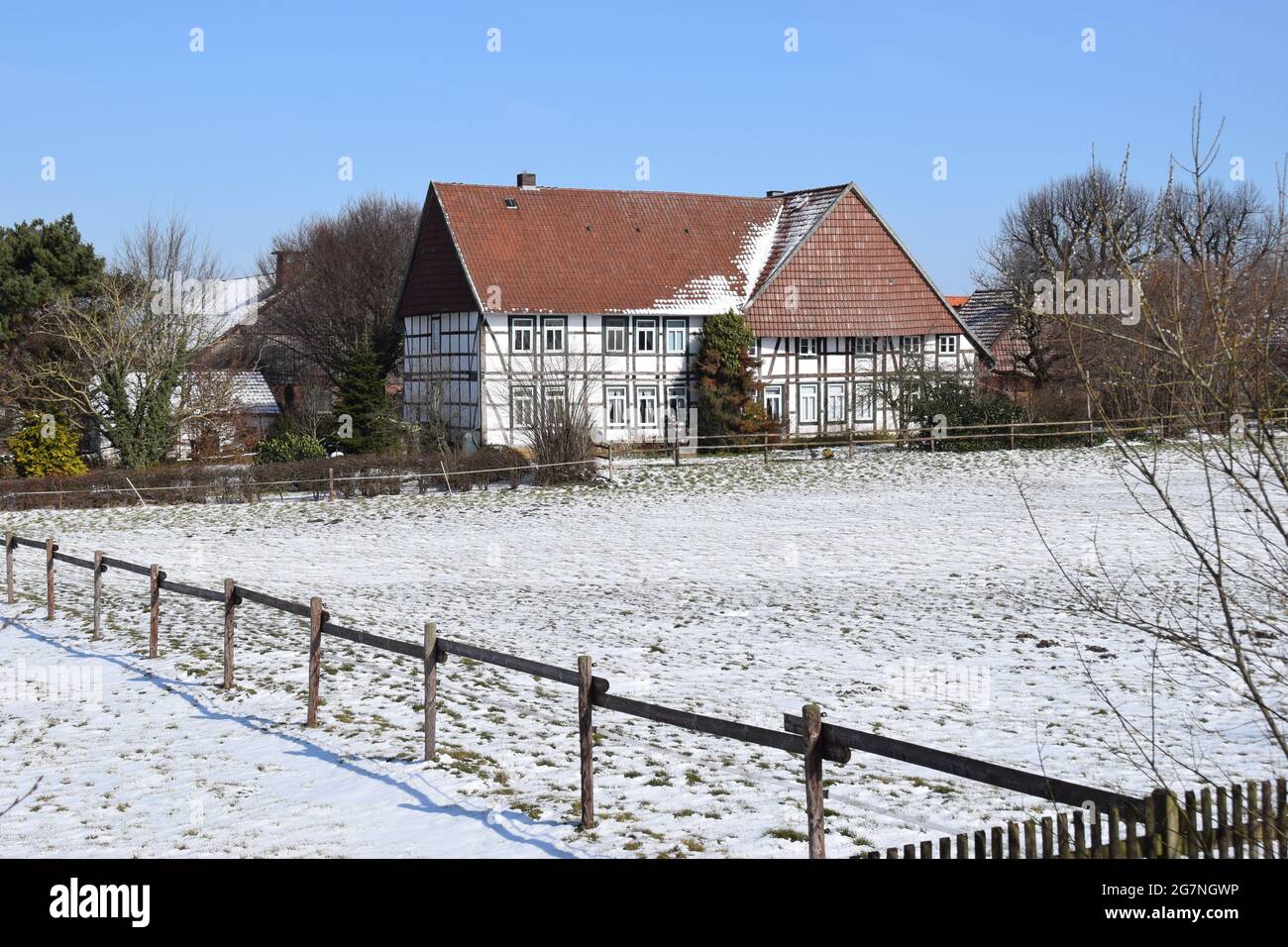 Traditional half-timbered farmhouse in Schaumburg in winter Stock Photo ...