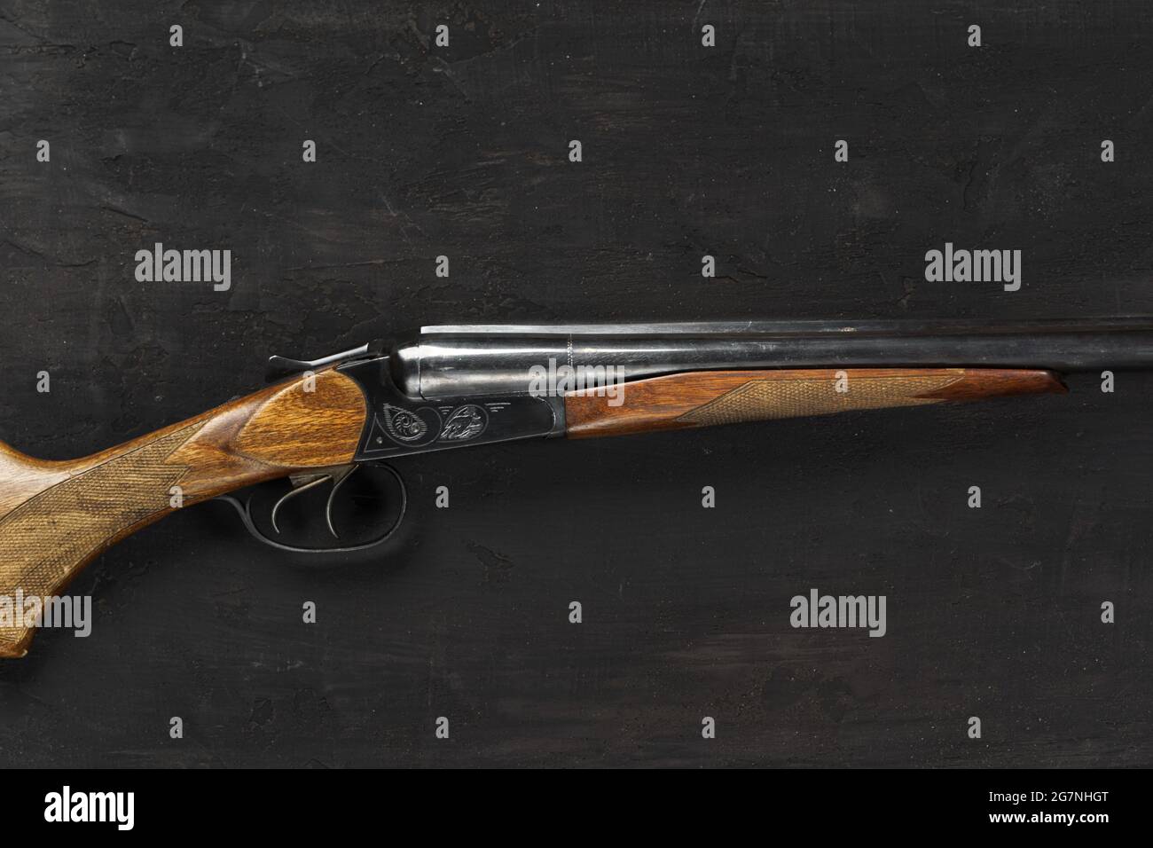 Smoothbore hunting gun on black background close up Stock Photo - Alamy