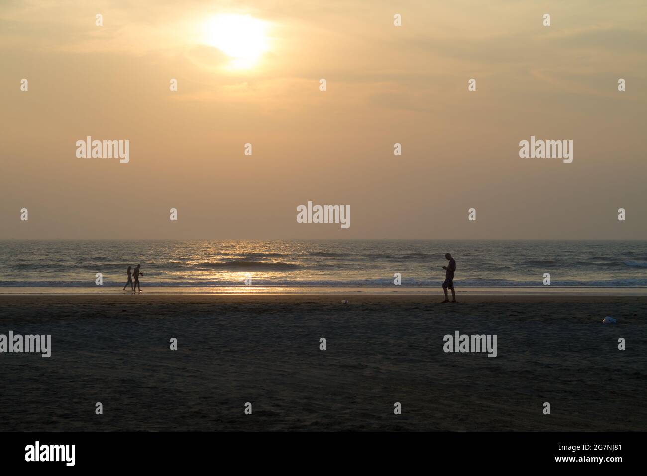 Peaceful beach at golden sunset in Goa state in western India Stock ...