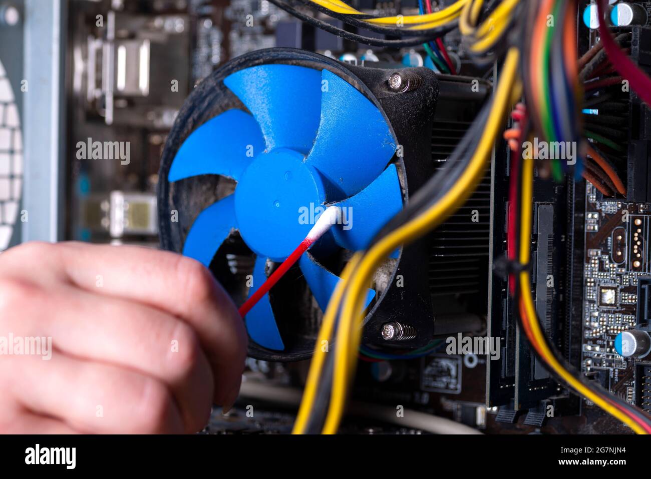 Internal parts of an old personal computer. Dusty motherboard, video ...