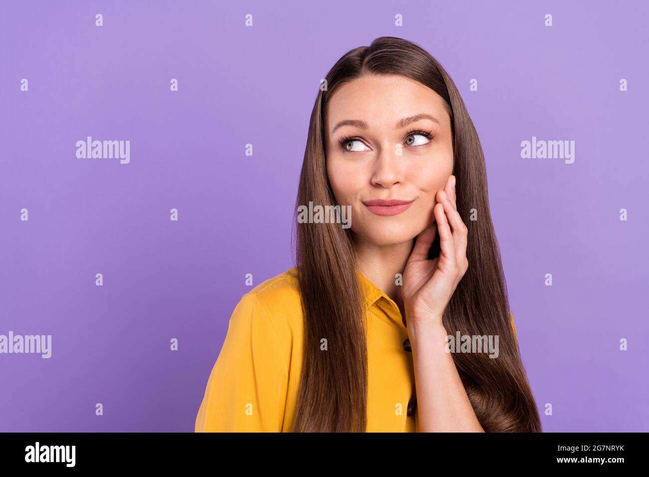 Photo of flirty young lady touch face look empty space wear yellow ...