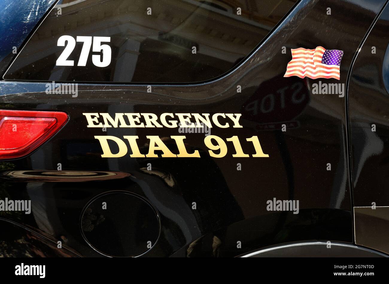 A police car with Emergency Dial 911 on its side Stock Photo - Alamy