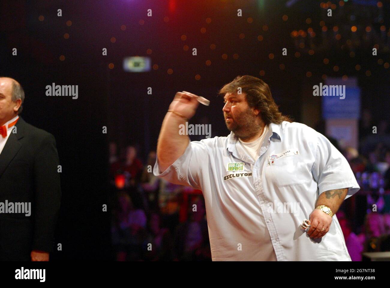 11 January, 2004: Kent publican ANDY FORDHAM prepares to throw a dart ...