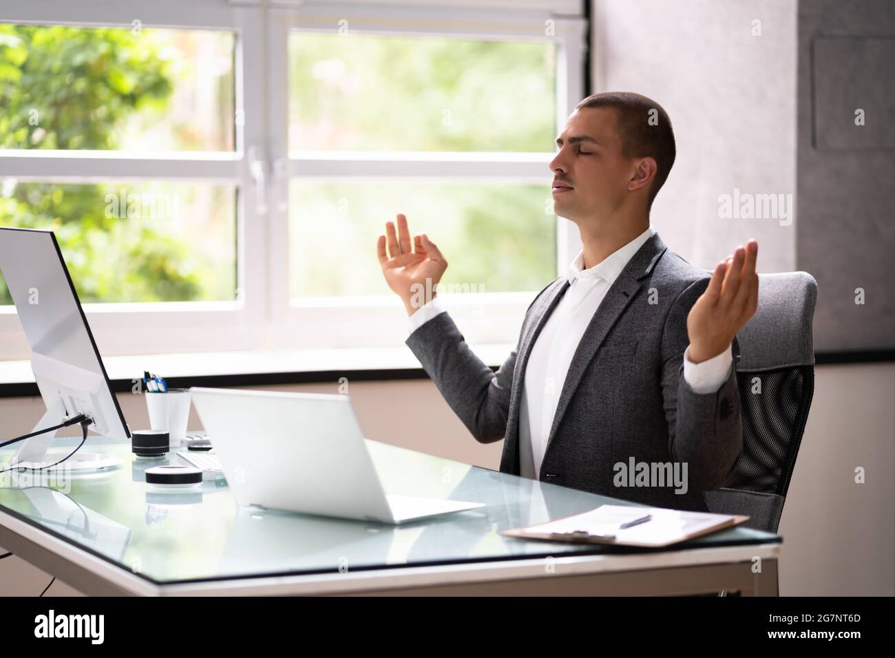 Yoga Meditation Exercise In Office. Male Business Man Meditating Stock ...