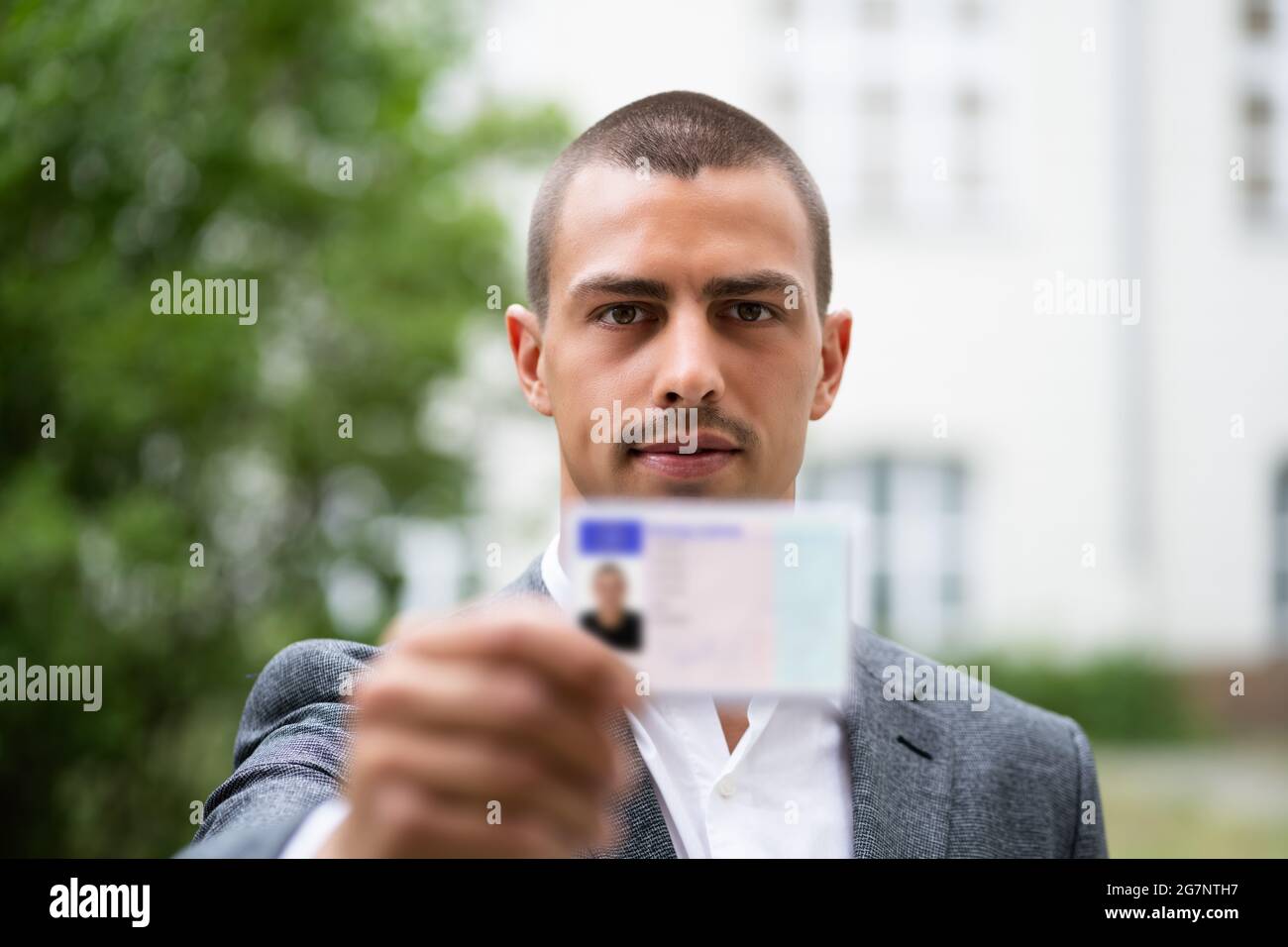 Bailiff Standing At House Entrance Showing Id Stock Photo - Alamy