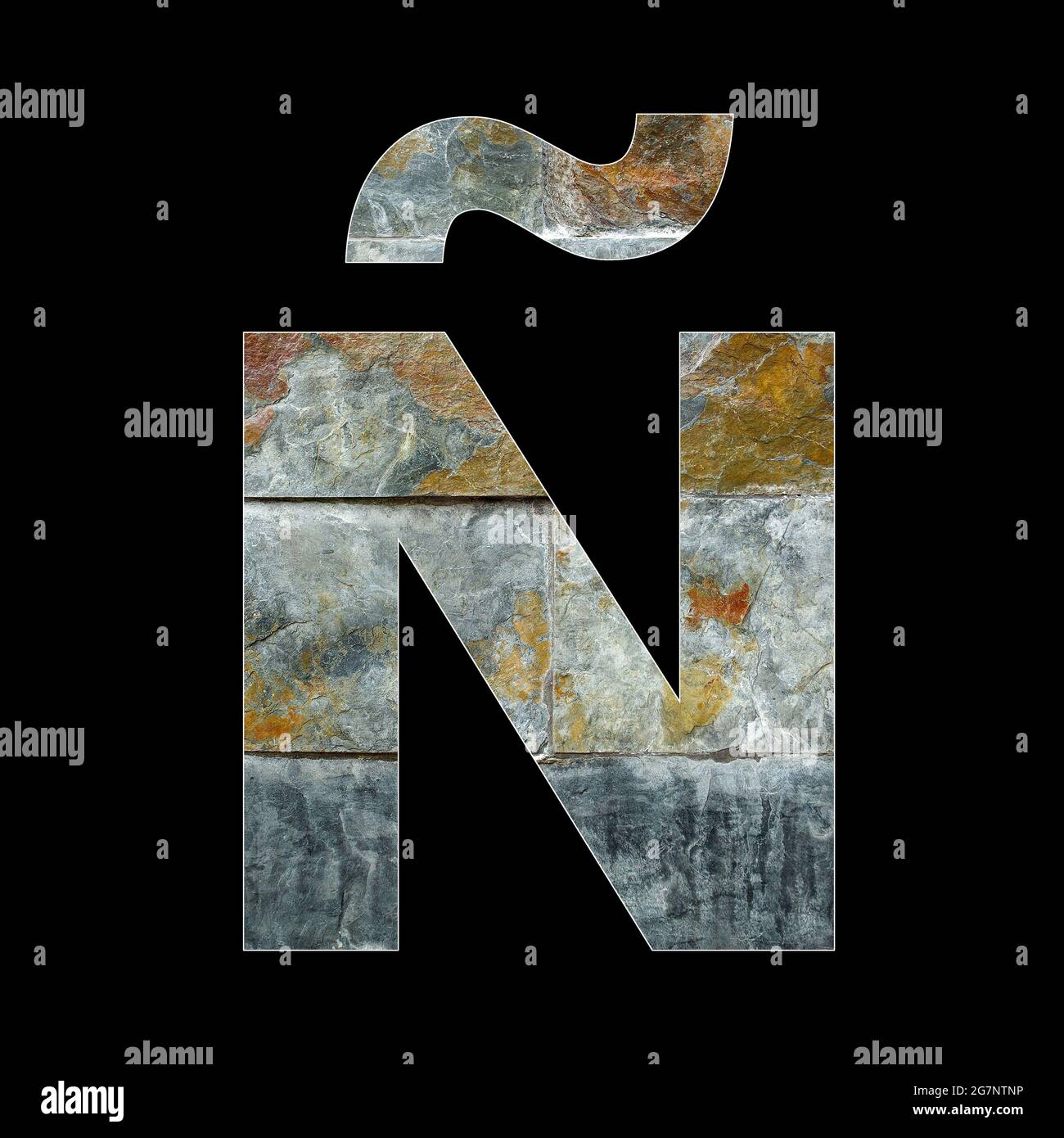 Alphabet letter Ñ - Rustic stone background Stock Photo - Alamy