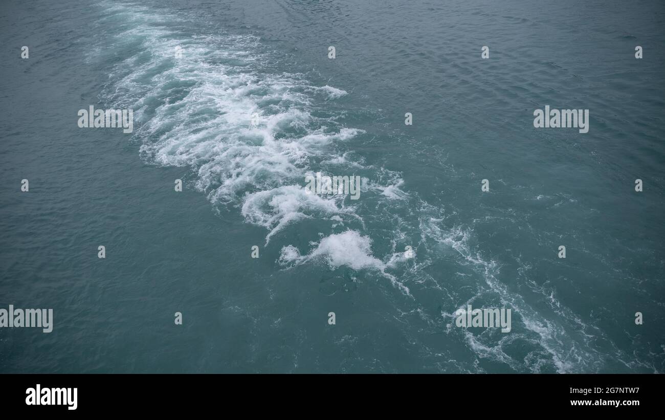 Boat trace on water surface Stock Photo - Alamy