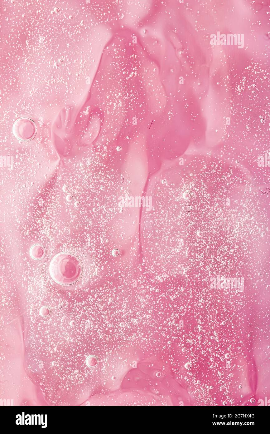 Abstract pink liquid background, paint splash, swirl pattern and water ...