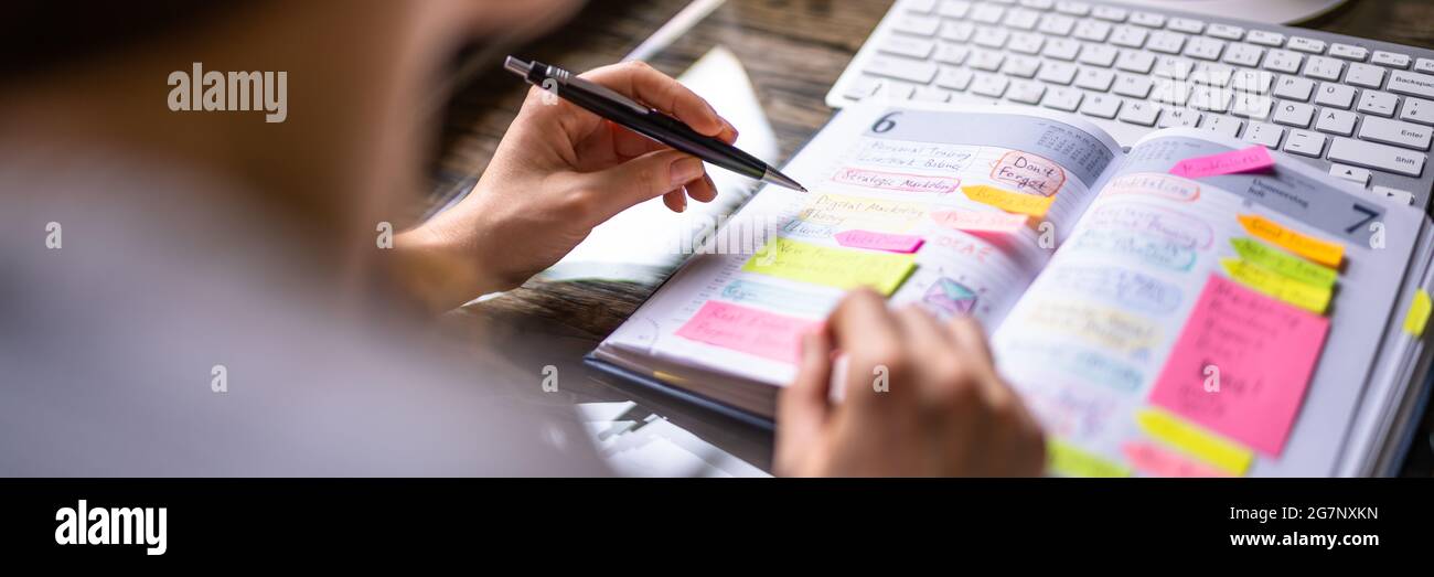 Event Organizer In Calendar Plan In Diary Stock Photo - Alamy