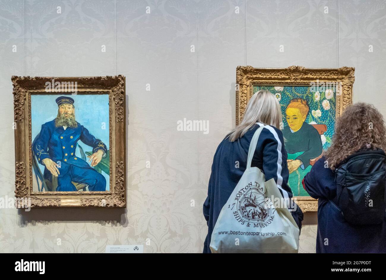 Two women study Van Gogh portraits at the Museum of Fine Art in Boston ...