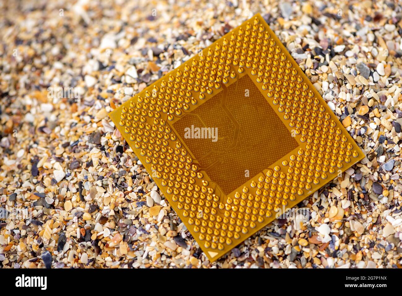 Close-up of a processor with sand in the background. Bottom view Stock ...