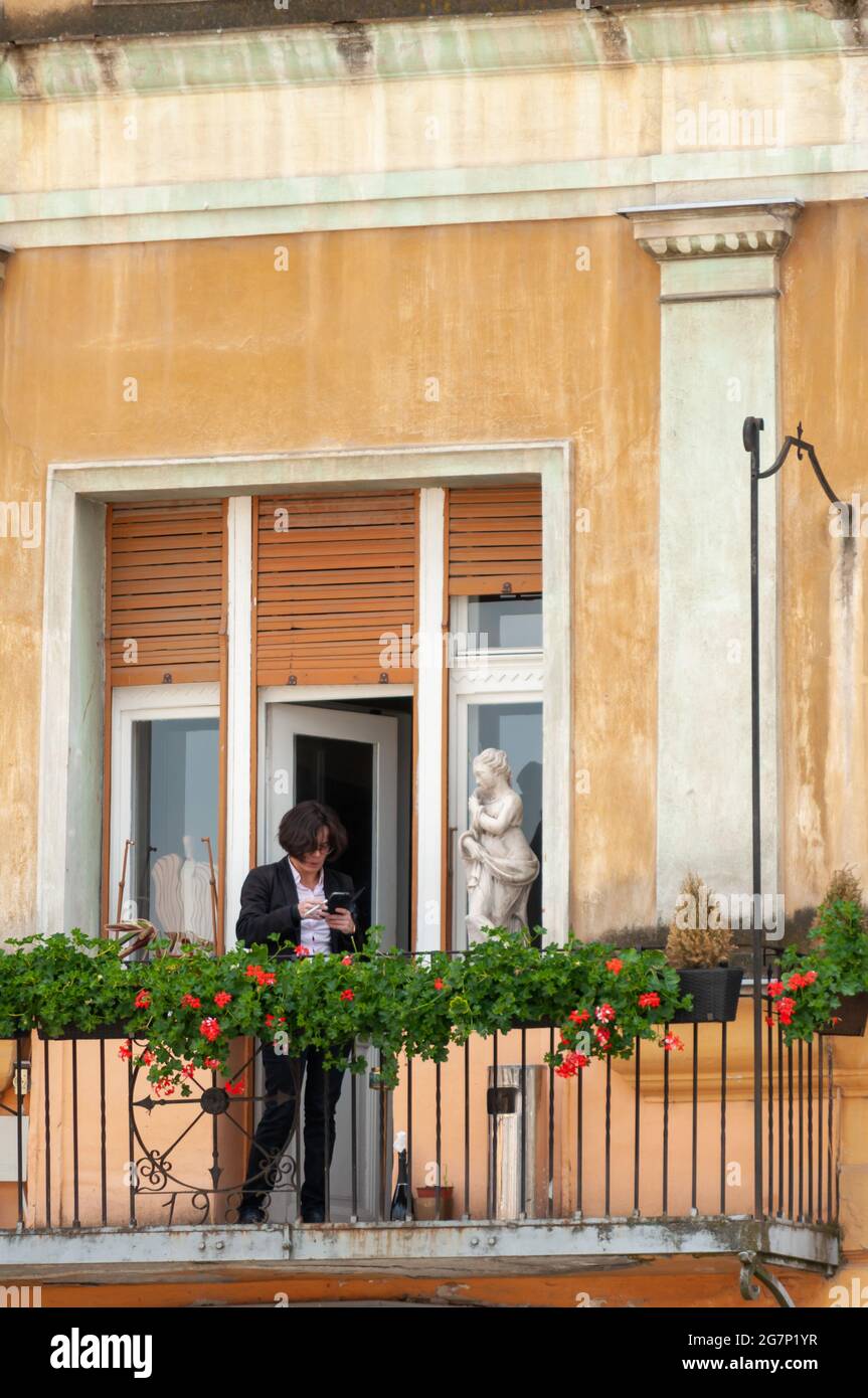 Woman smoking balcony hi-res stock photography and images - Alamy