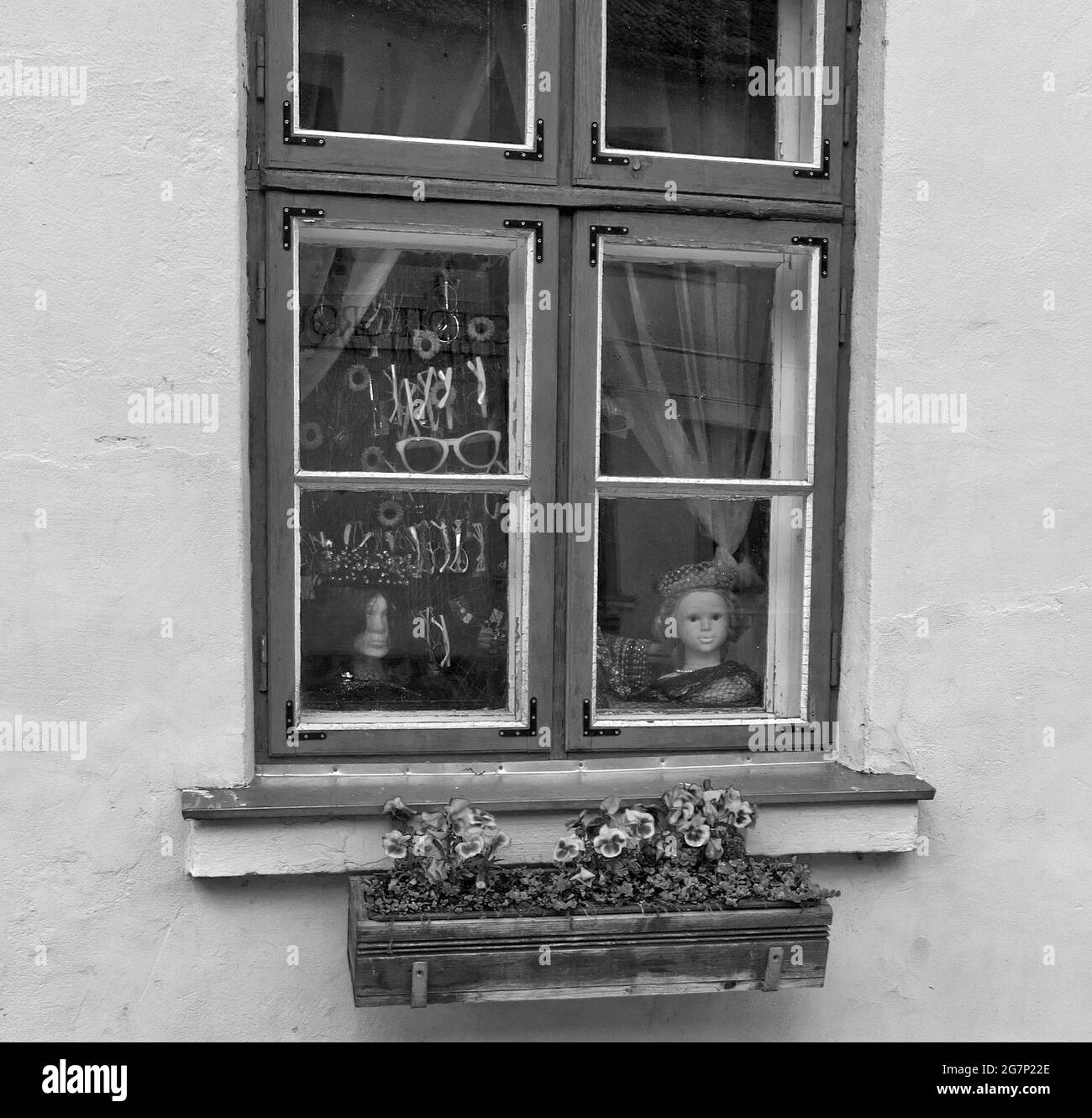 Dolls in the window Stock Photo - Alamy