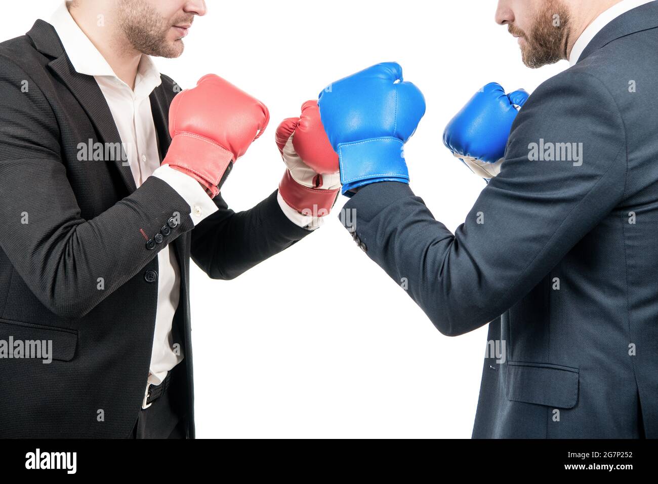 Professional men cropped view in business suits stand in fighting ...