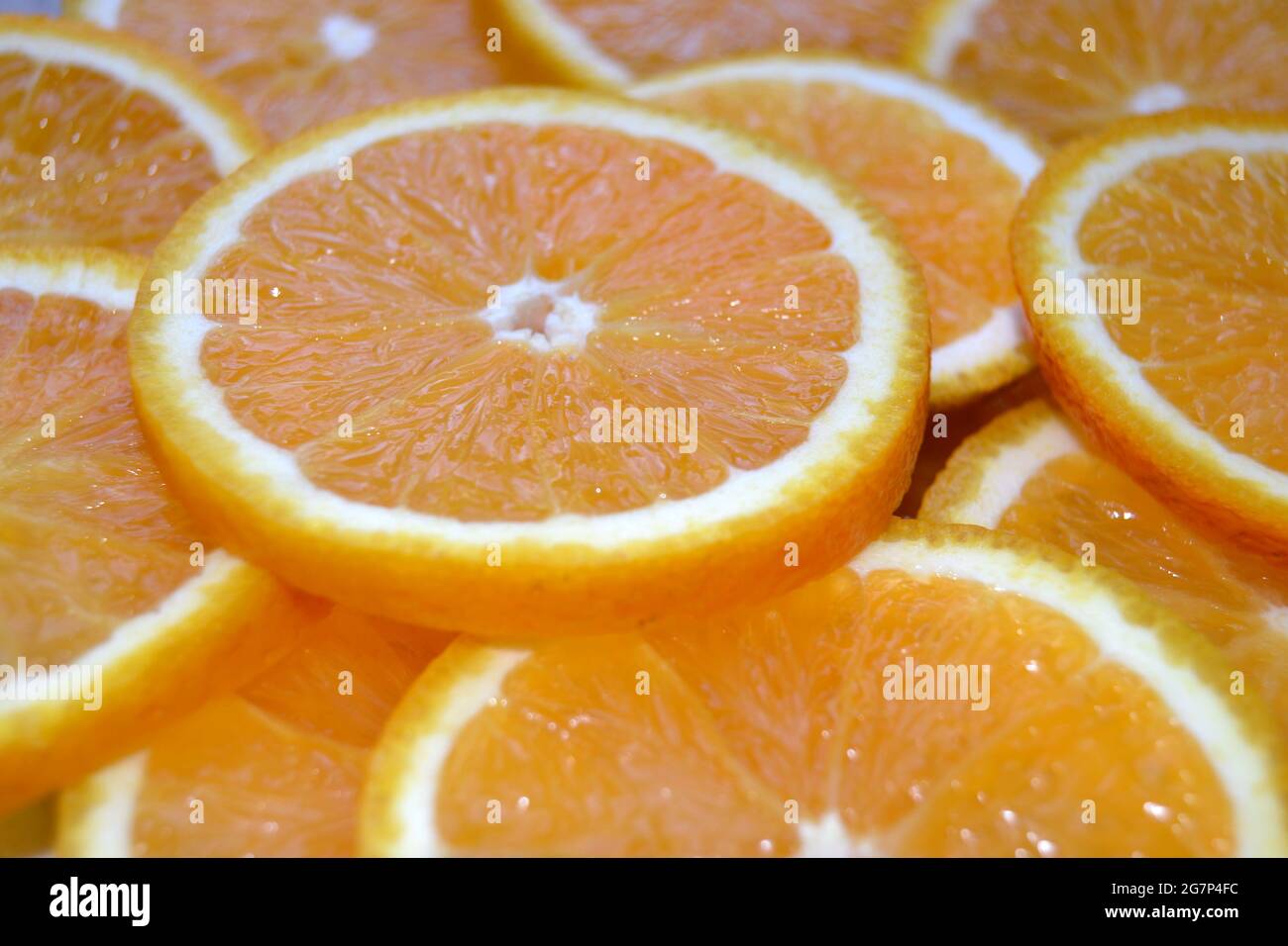 Abstract background with citrus fruit of orange slices. Close up. Studio photography. Soft focus ...
