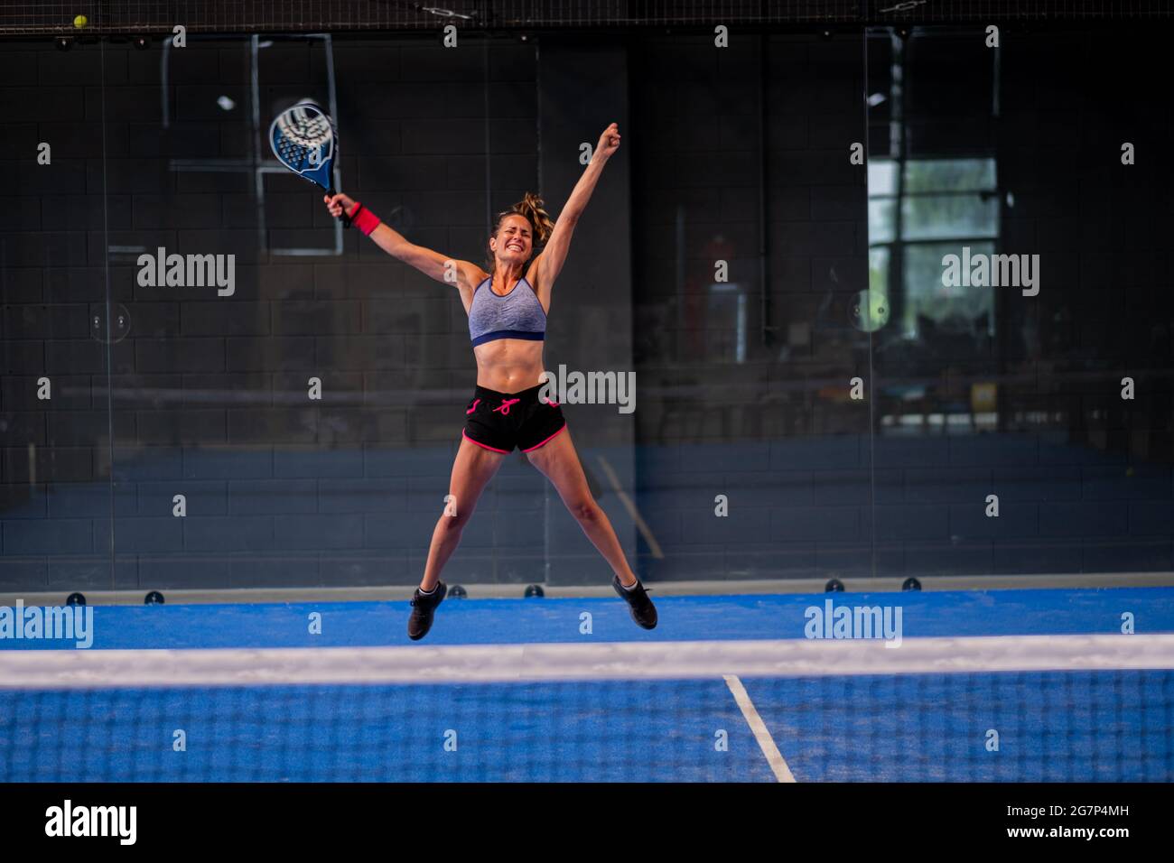 Girl playing tennis on court hi-res stock photography and images - Alamy