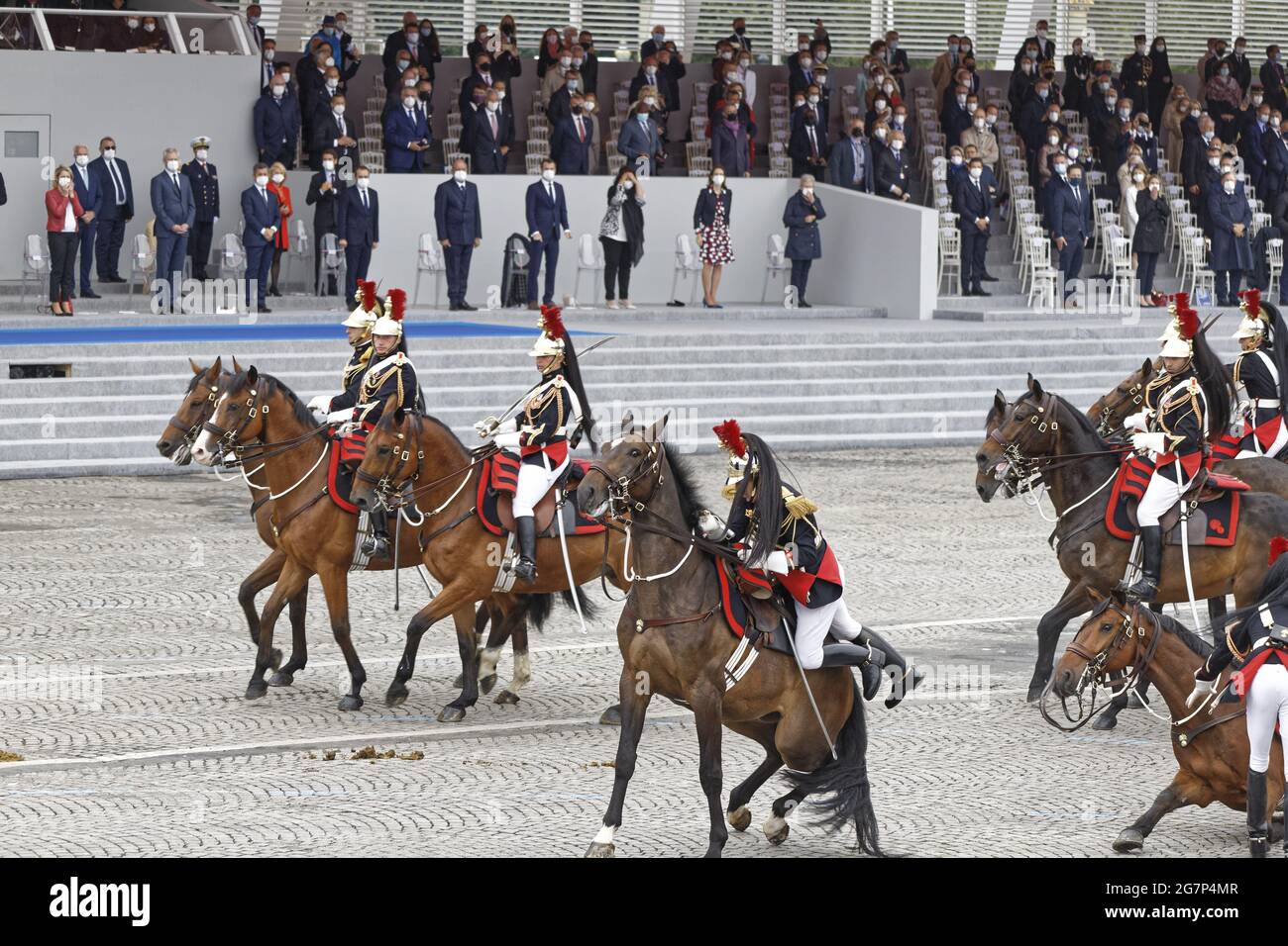 Paris, France. 14th July, 2021. Republican guard falls from horse in ...