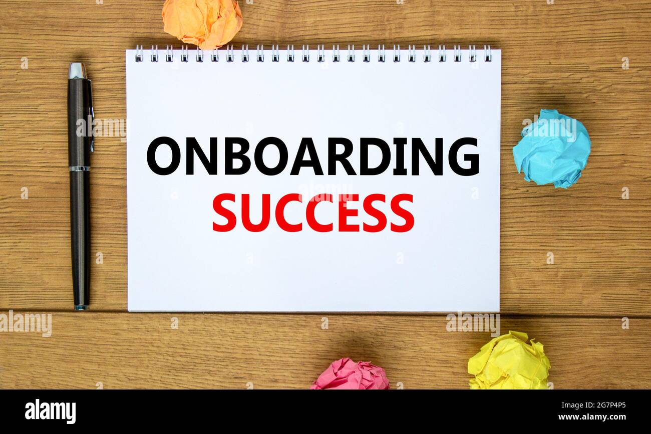 Onboarding success symbol. Words 'Onboarding success' on white note on ...