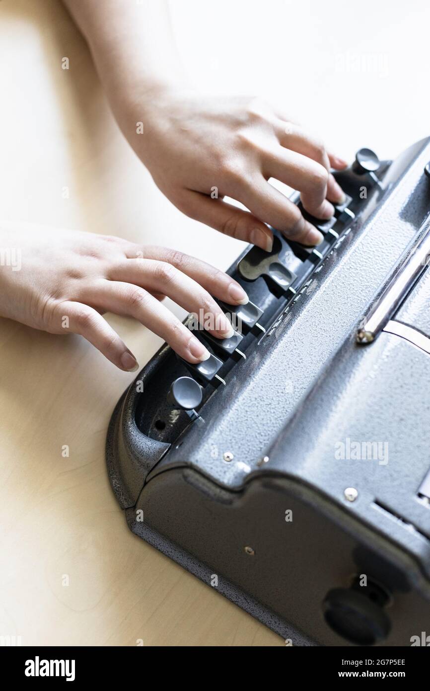 Moscow, Russia - June 5, 2021: fingers press of Perkins Brailler ...