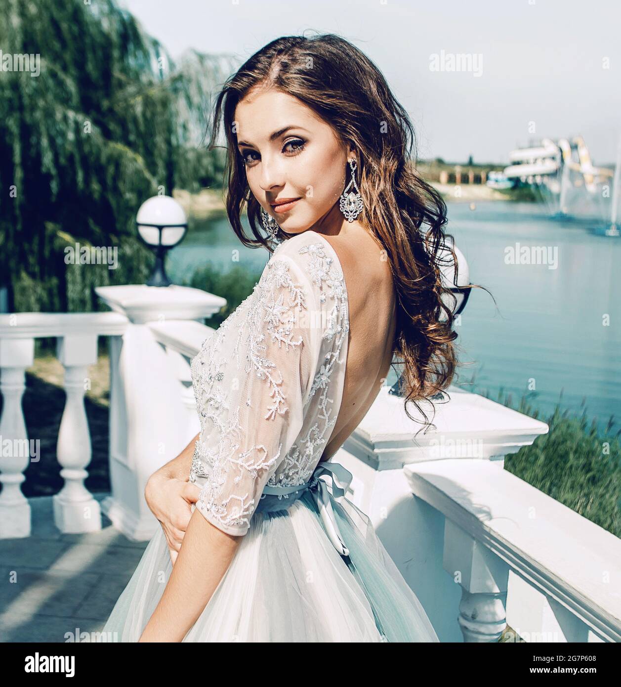 Beautiful young lady stands hi-res stock photography and images - Alamy