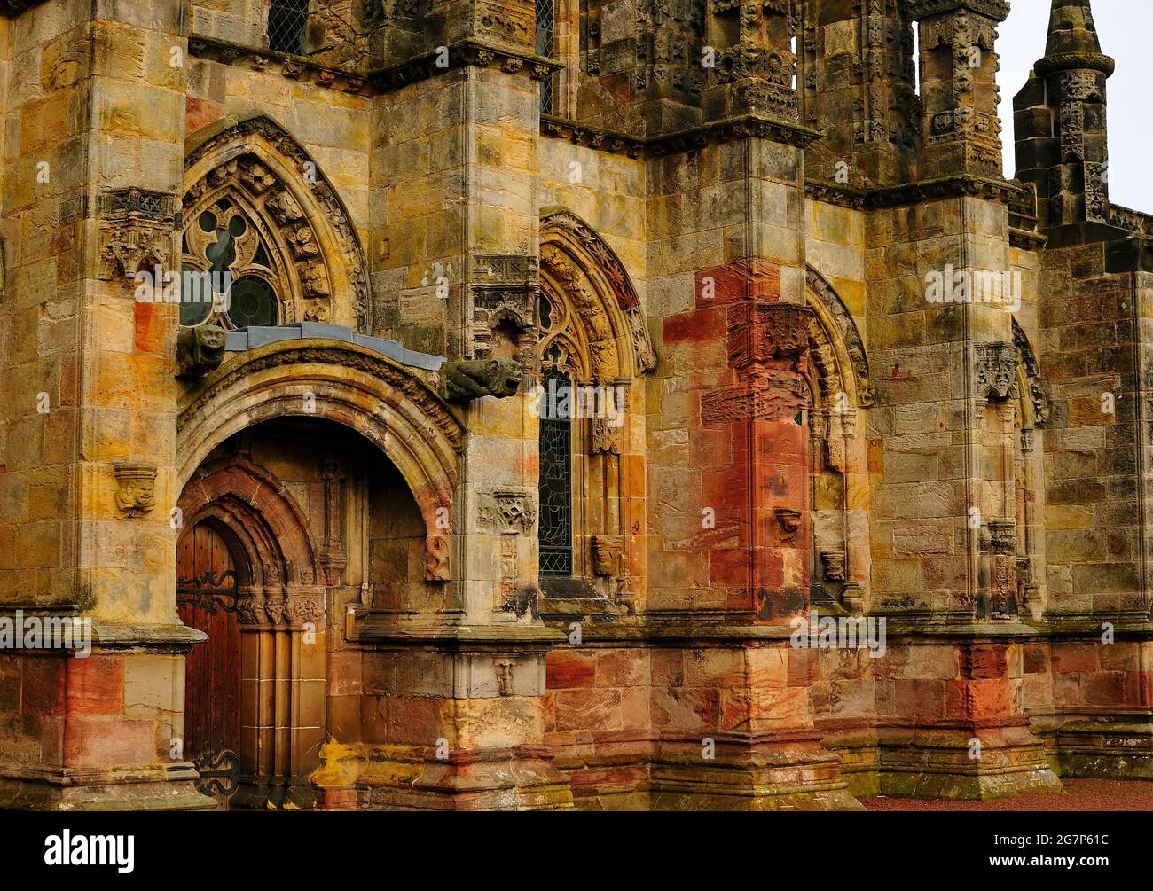 An external view of sections of the entrance and wall of Rosslyn Chapel ...