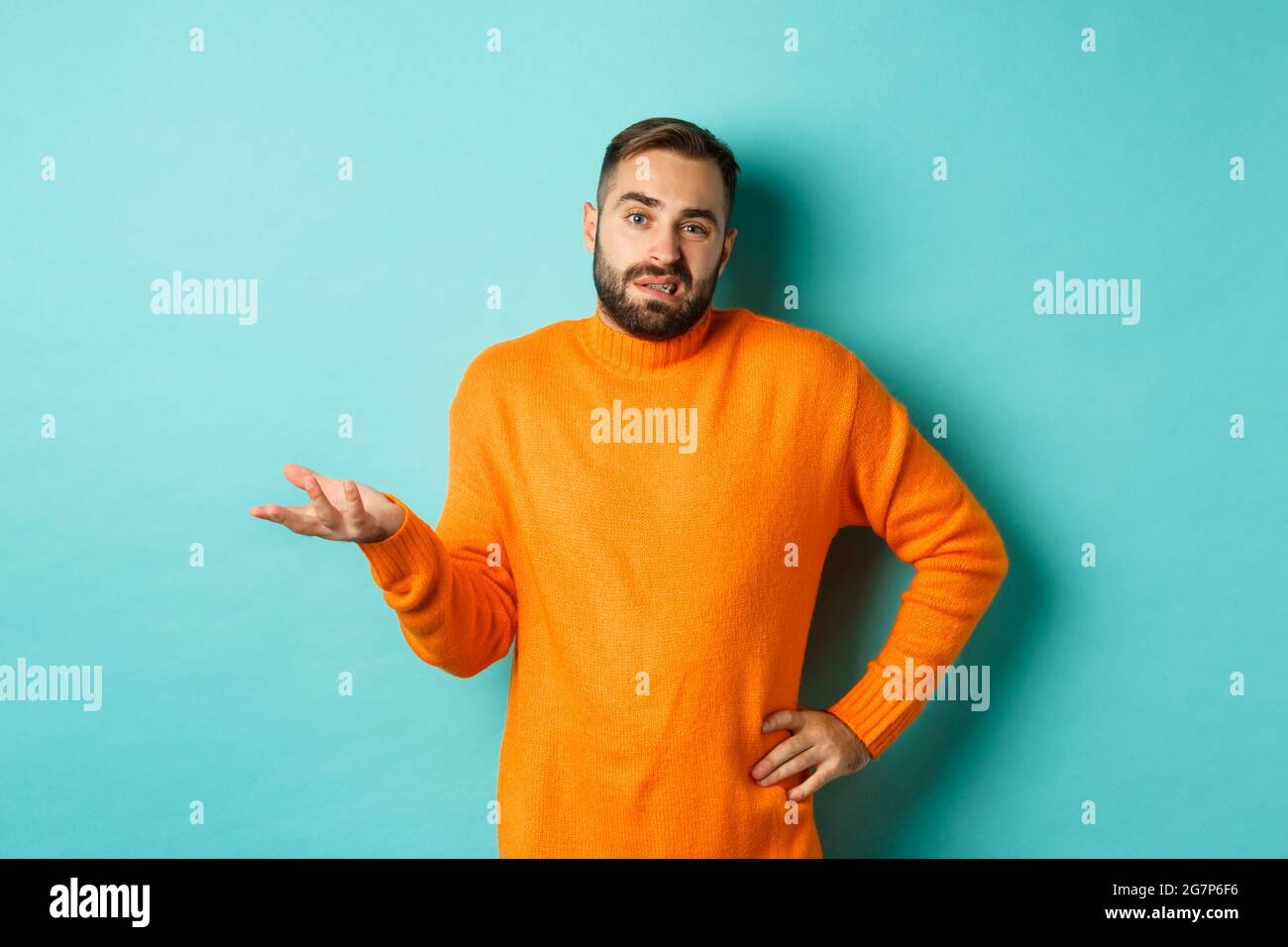 Careless and indifferent guy shrugging, looking unbothered, dont know ...