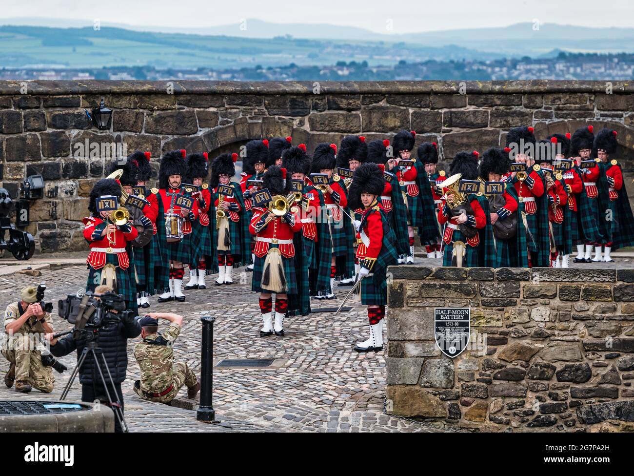 Scottish military regiment brass band in kilt uniforms playing musical ...
