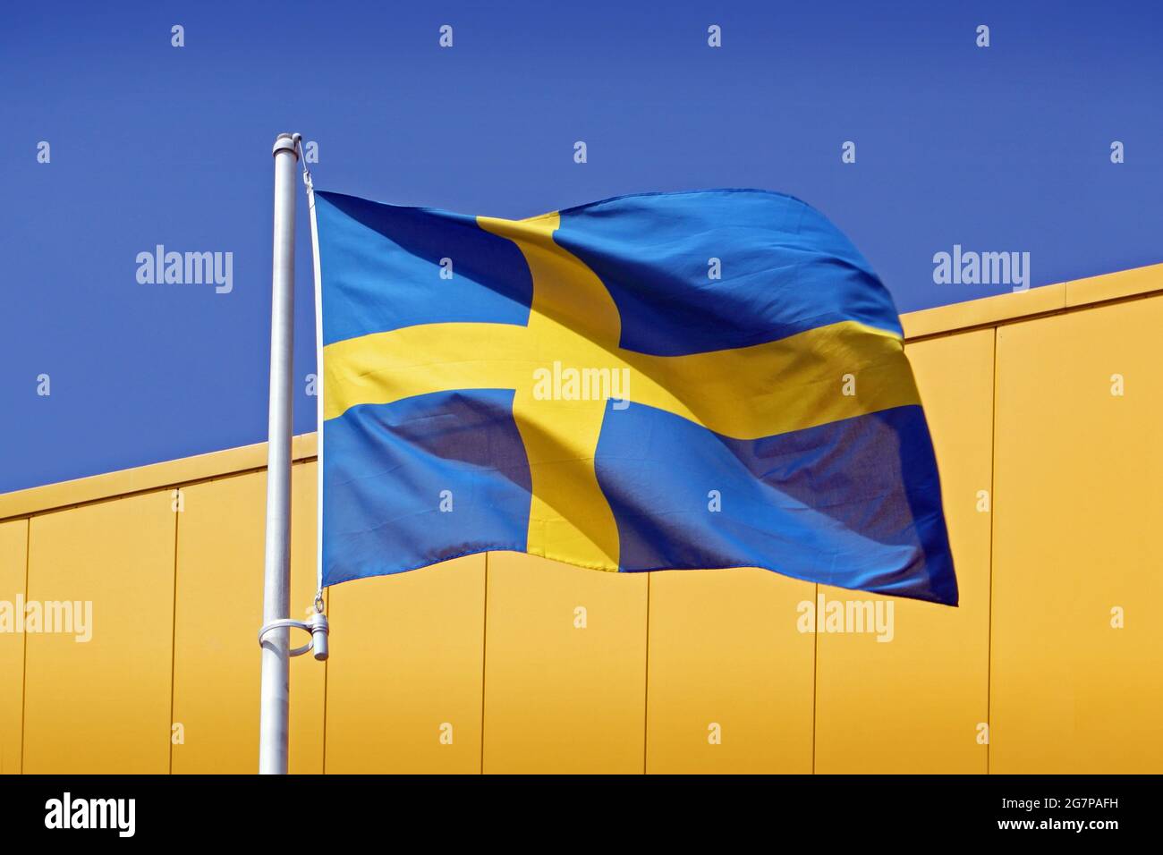 The Swedish Flag against a background of Swedish colours Stock Photo ...