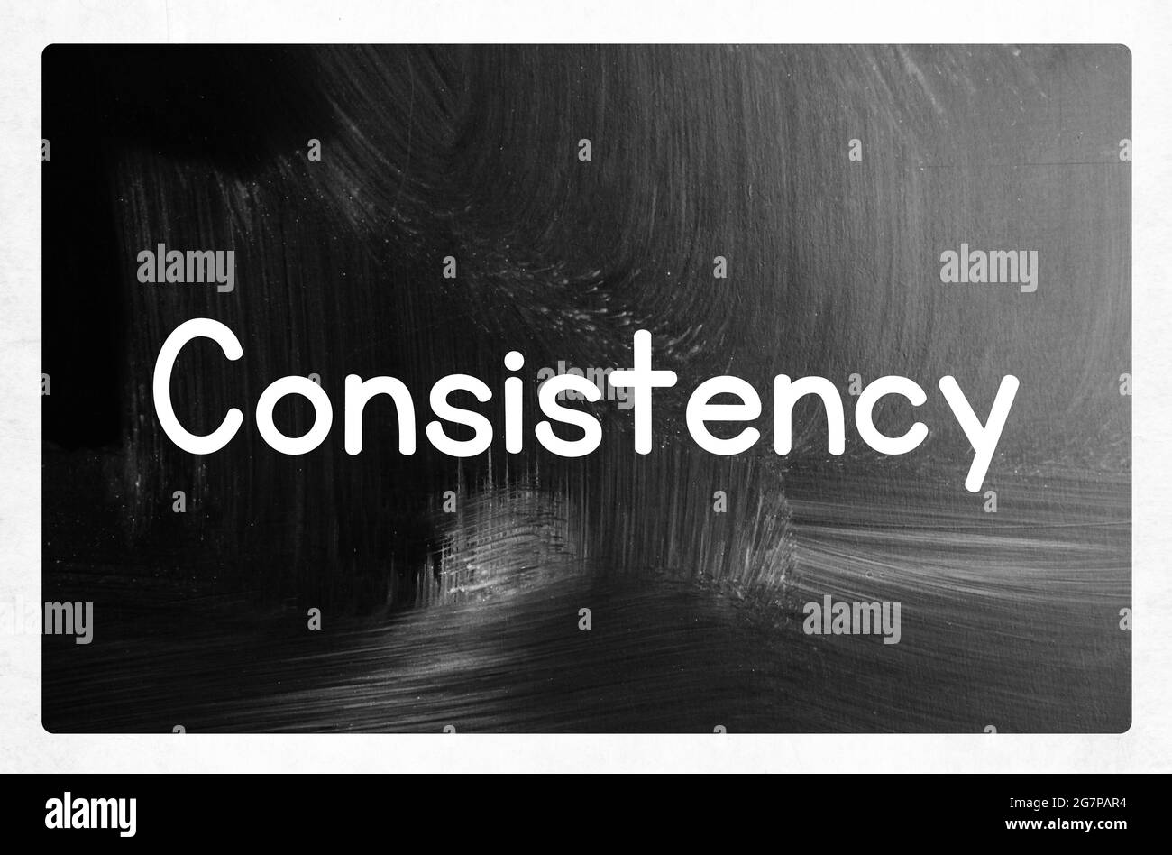 Grayscale illustration with the word "Consistency" on the blackboard ...