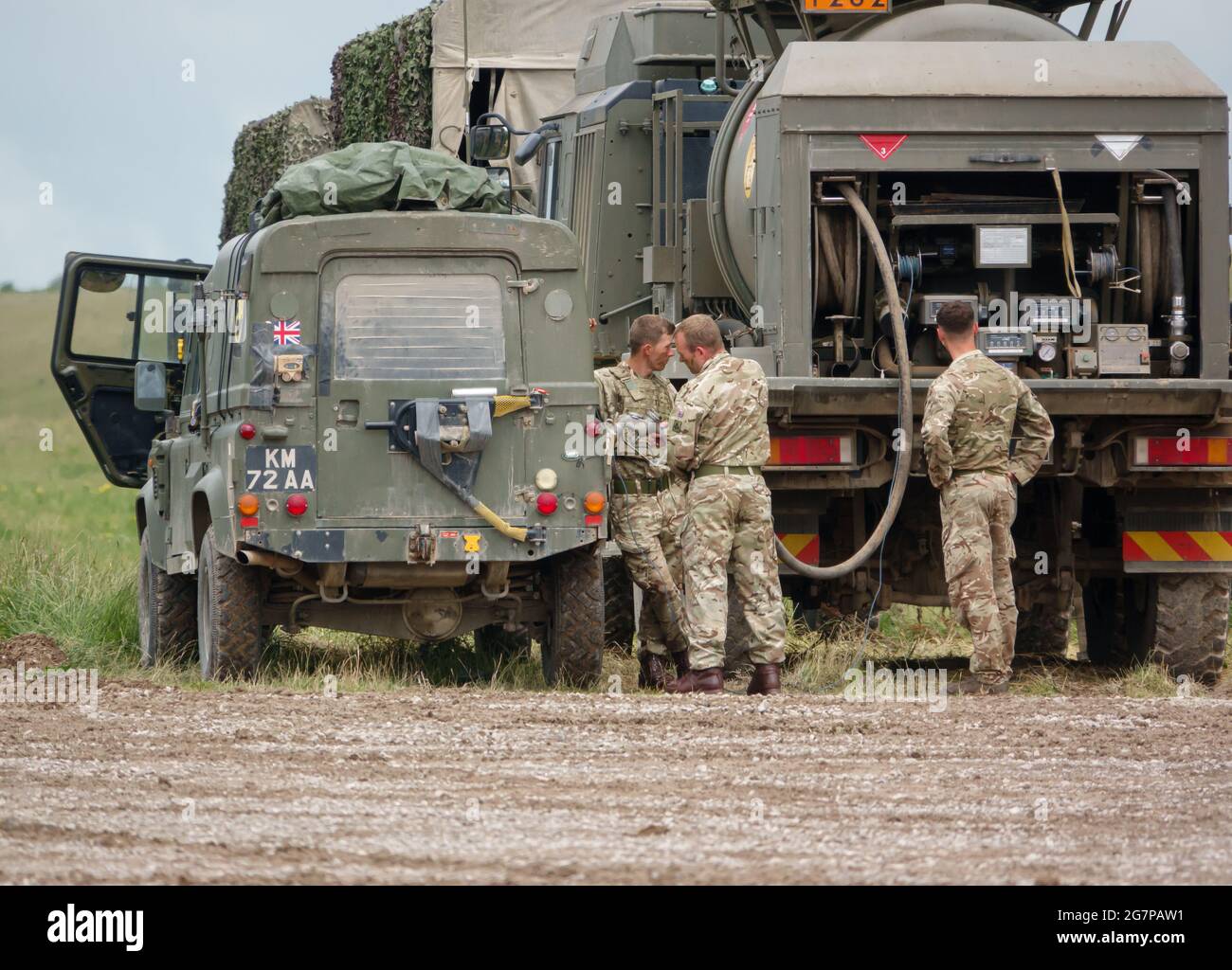 British army Land Rover Defender light utility vehicle with a M.A.N ...