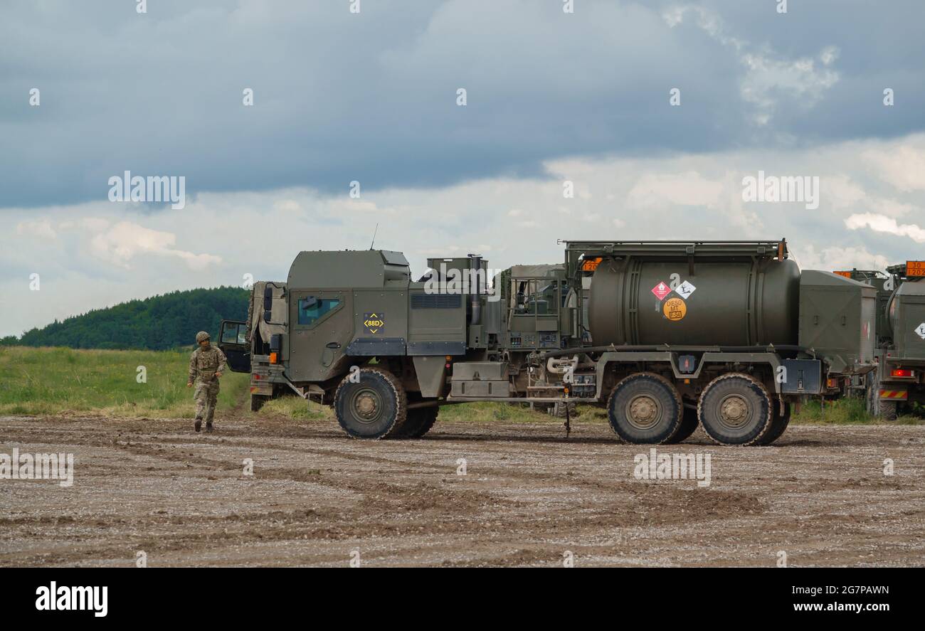 British army M.A.N. unit support tanker on exercise, Salisbury Plain ...