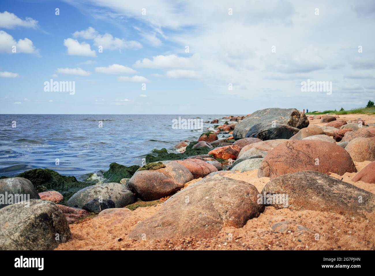 Beautiful scenery of rocks and pebbles on the beach Stock Photo - Alamy
