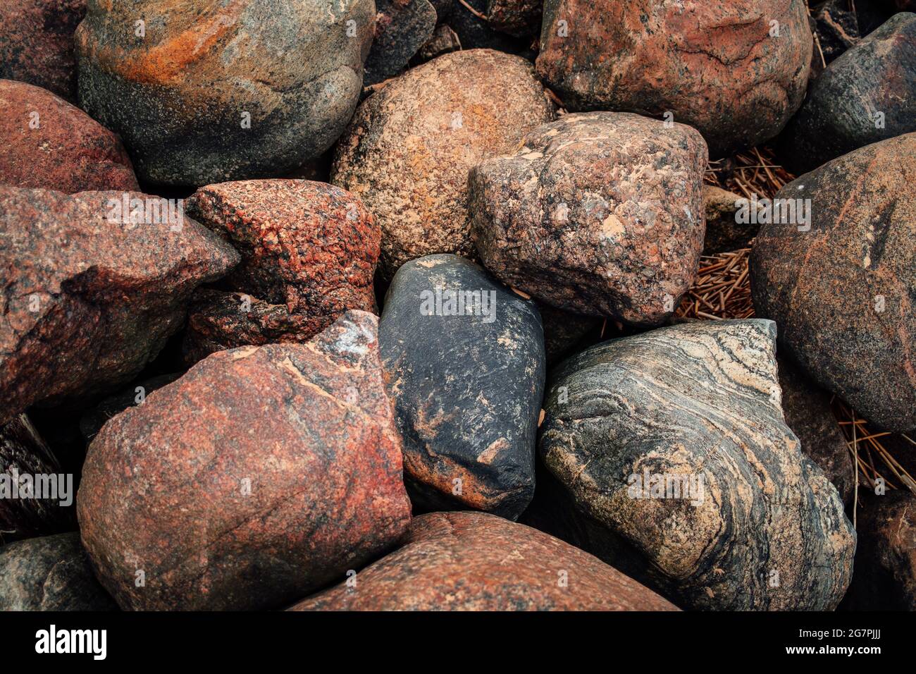 Beautiful scenery of rocks and pebbles on the beach Stock Photo - Alamy