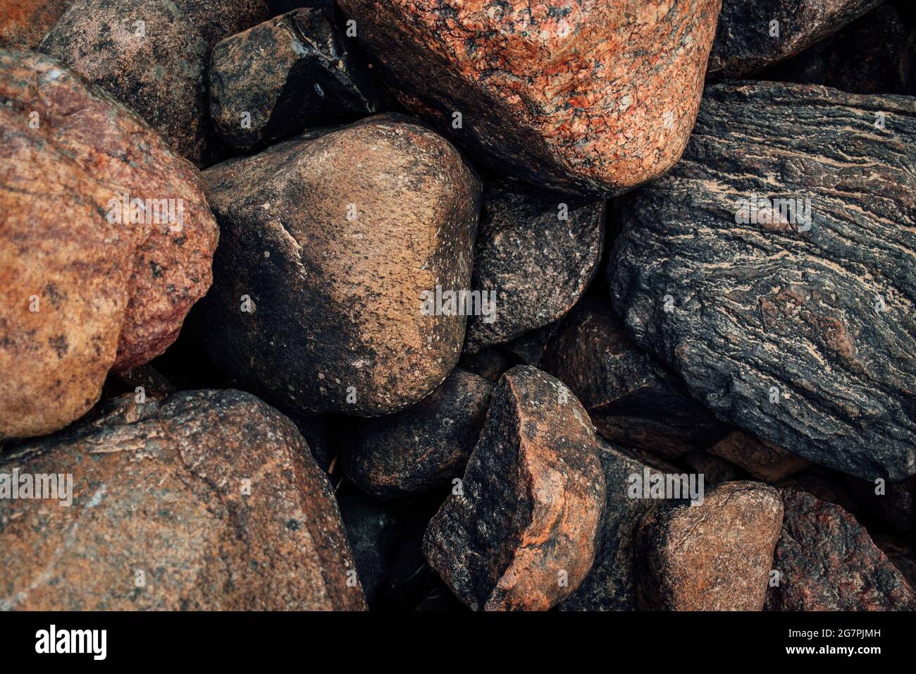 Beautiful scenery of rocks and pebbles on the beach Stock Photo - Alamy