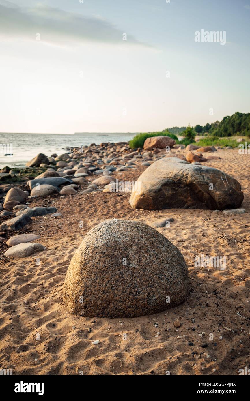 Beautiful scenery of rocks and pebbles on the beach Stock Photo - Alamy