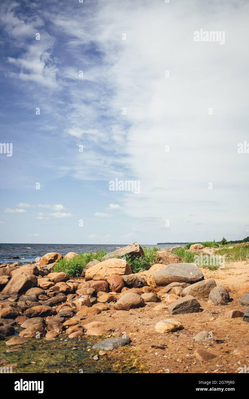 Beautiful scenery of rocks and pebbles on the beach Stock Photo - Alamy