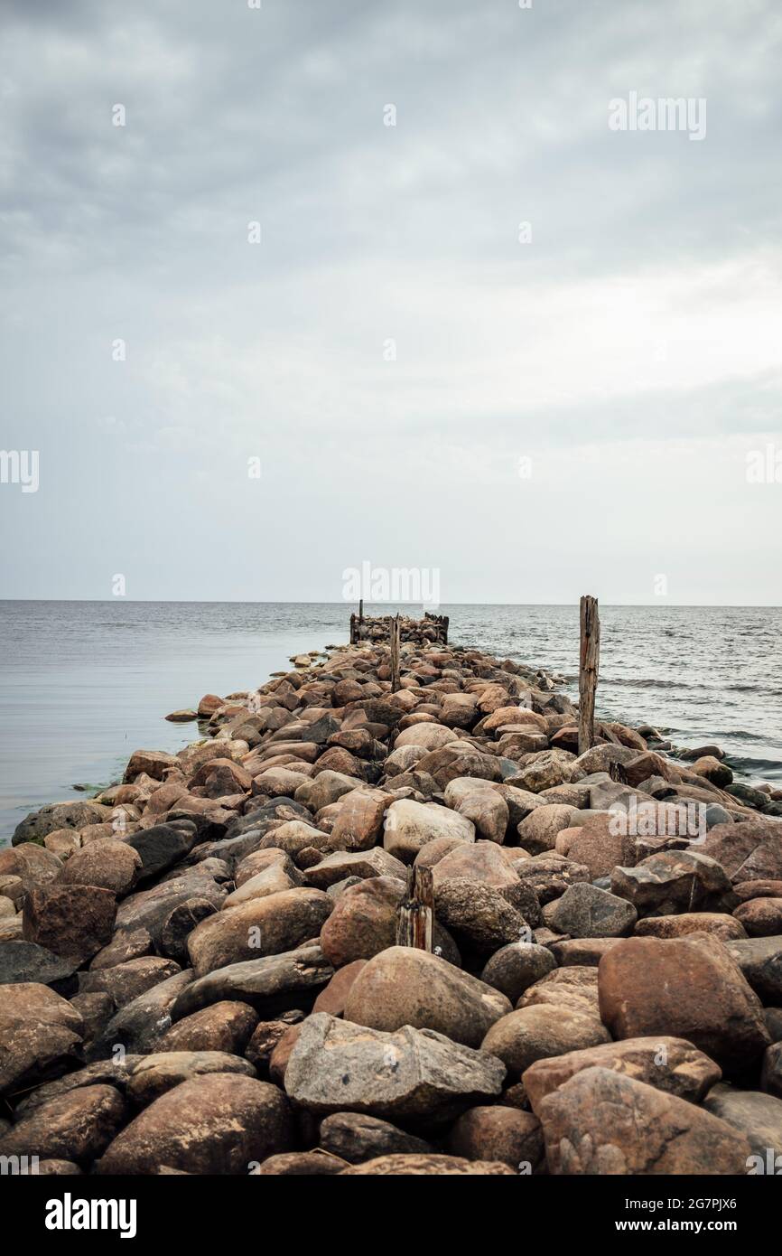 Beautiful scenery of rocks and pebbles on the beach Stock Photo - Alamy