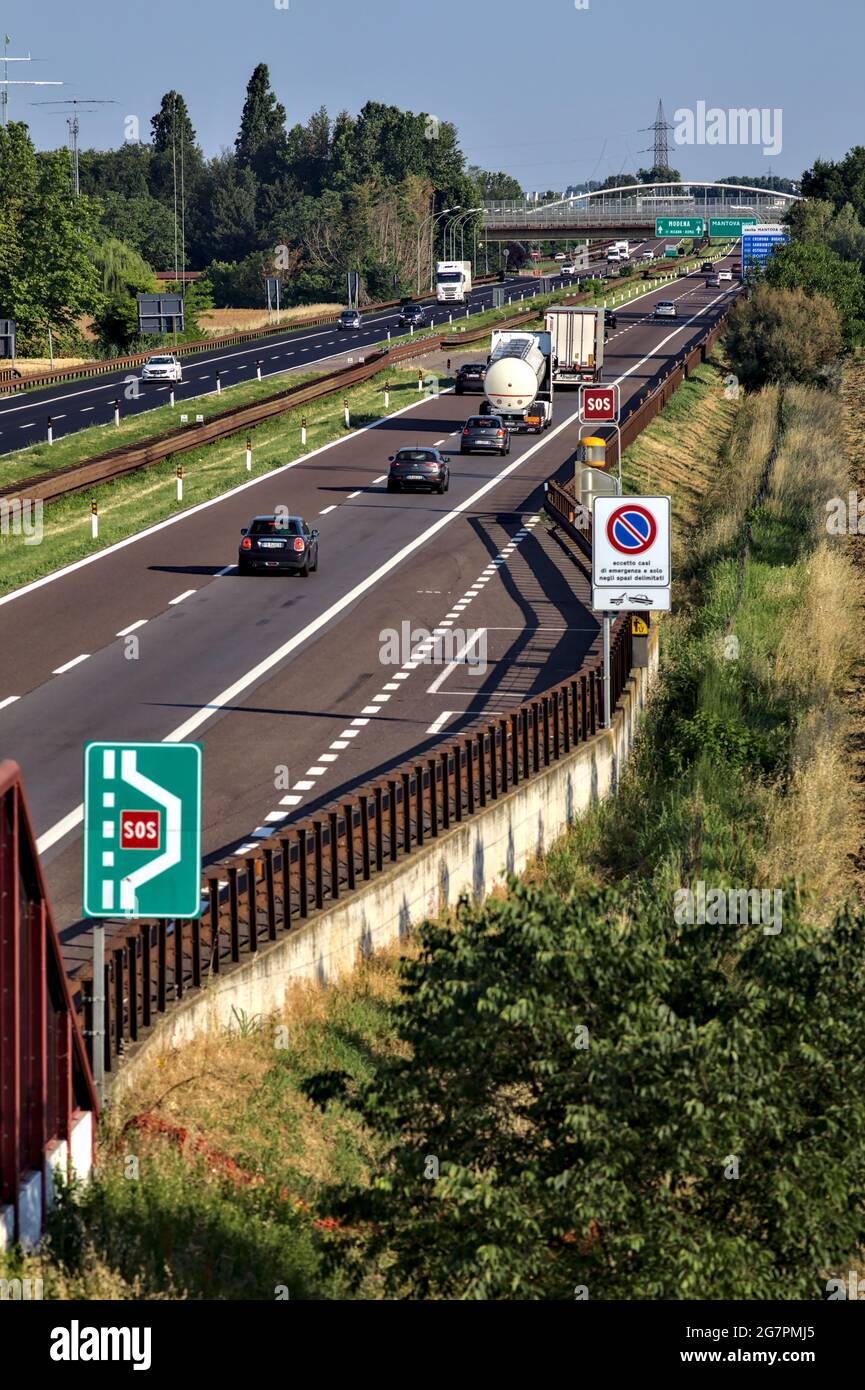 Italian highway in the countryside at sunset in summer Stock Photo - Alamy