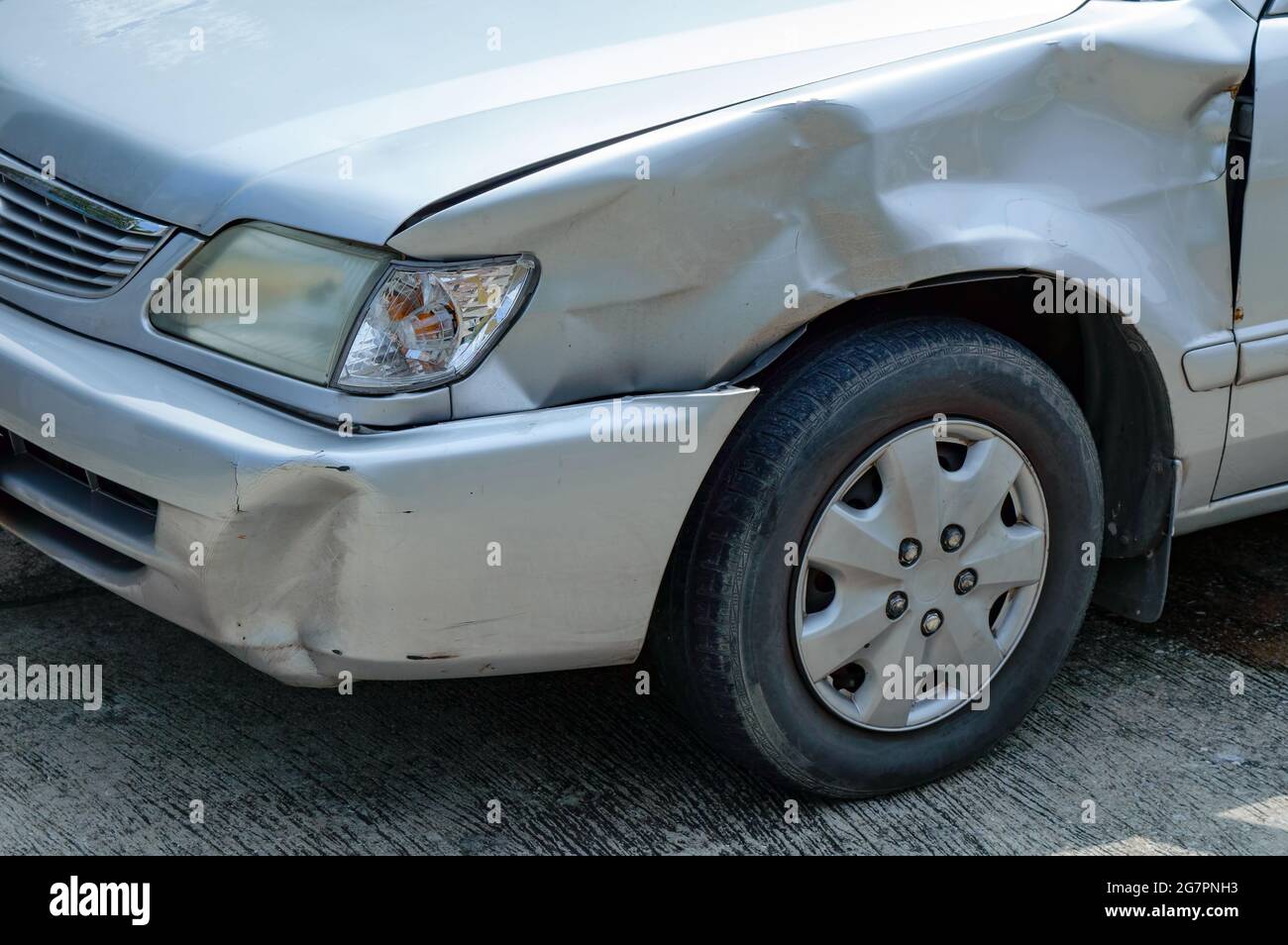 a scared marks on a front-left car body from accidentally hit by fast ...