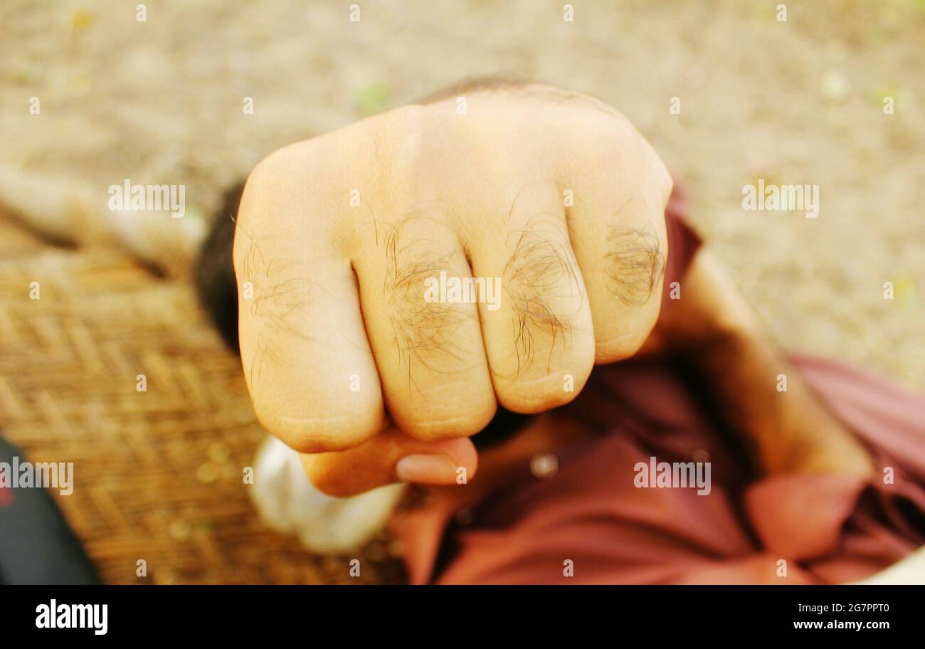 Male punching towards the camera Stock Photo - Alamy