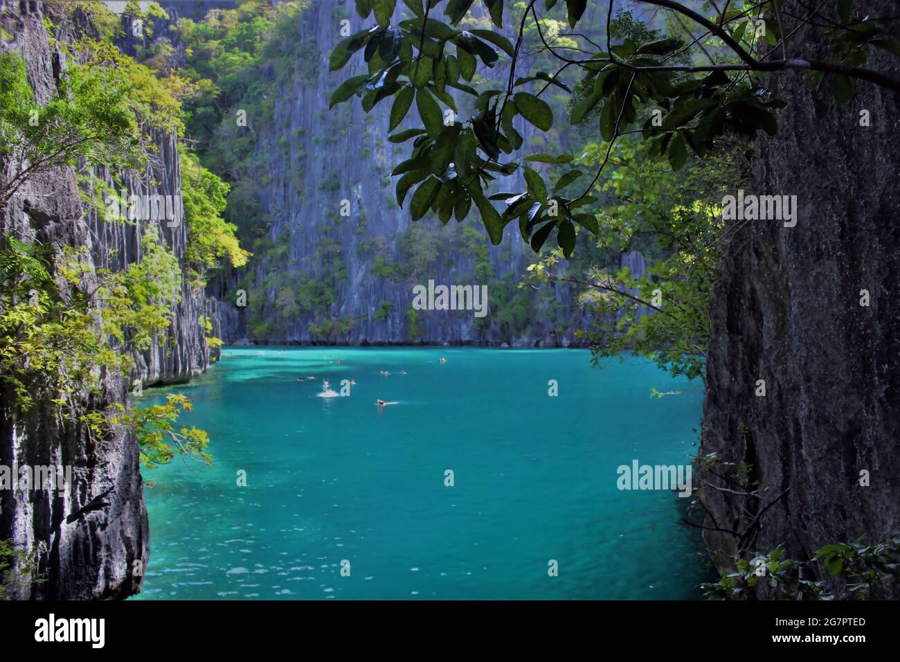 A cool hidden lake in Coron, Palawan, Philippines with outriggers Stock ...
