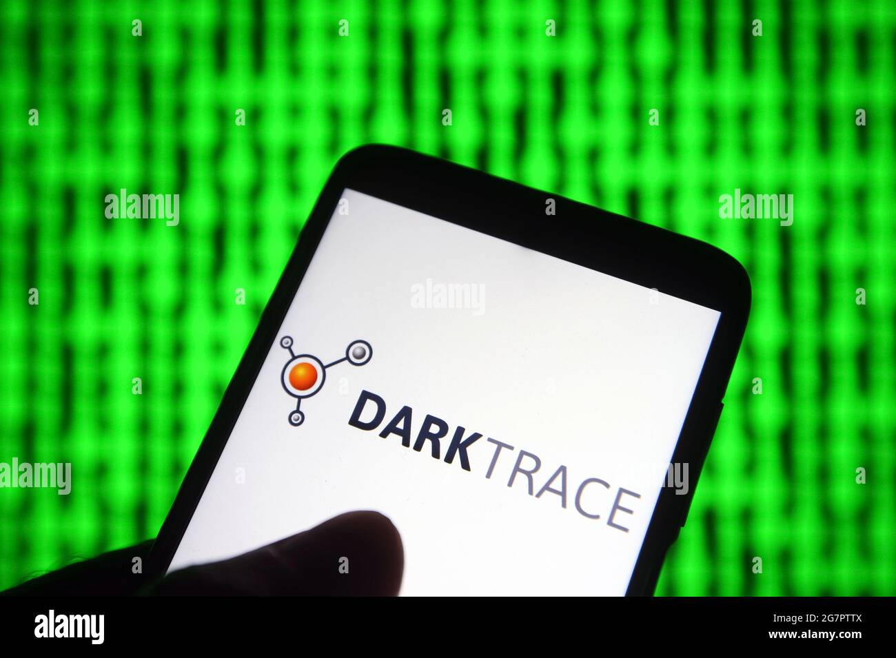 In this photo illustration, Darktrace logo of a company that ...