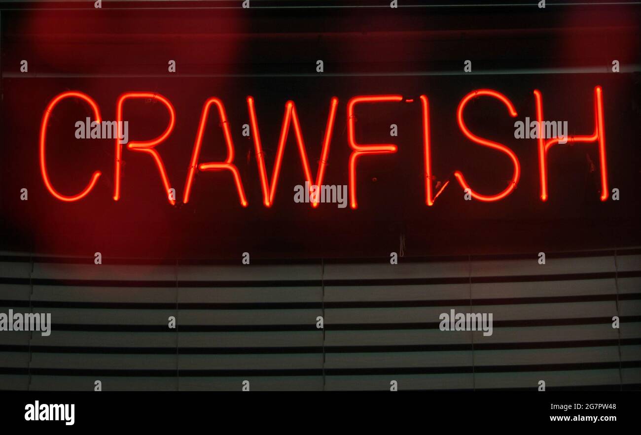 Bright neon red illuminated CRAWFISH sign Stock Photo - Alamy