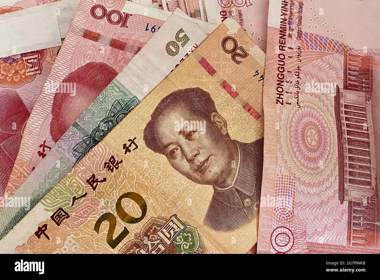 Closeup of different valued RMB banknotes or Chinese currency banknotes ...