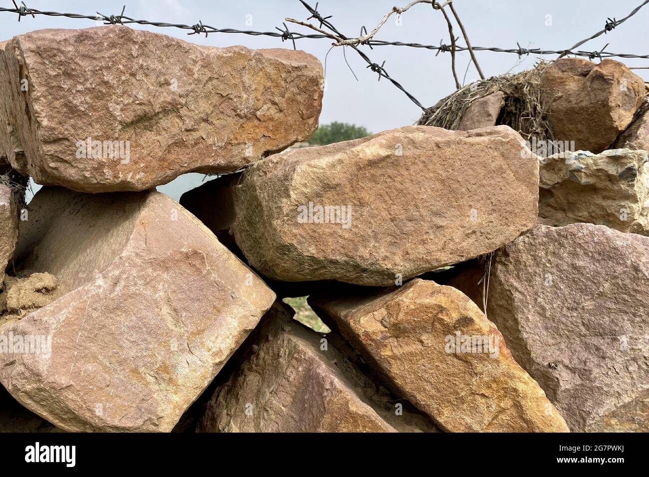 Barb wire rocks hi-res stock photography and images - Alamy