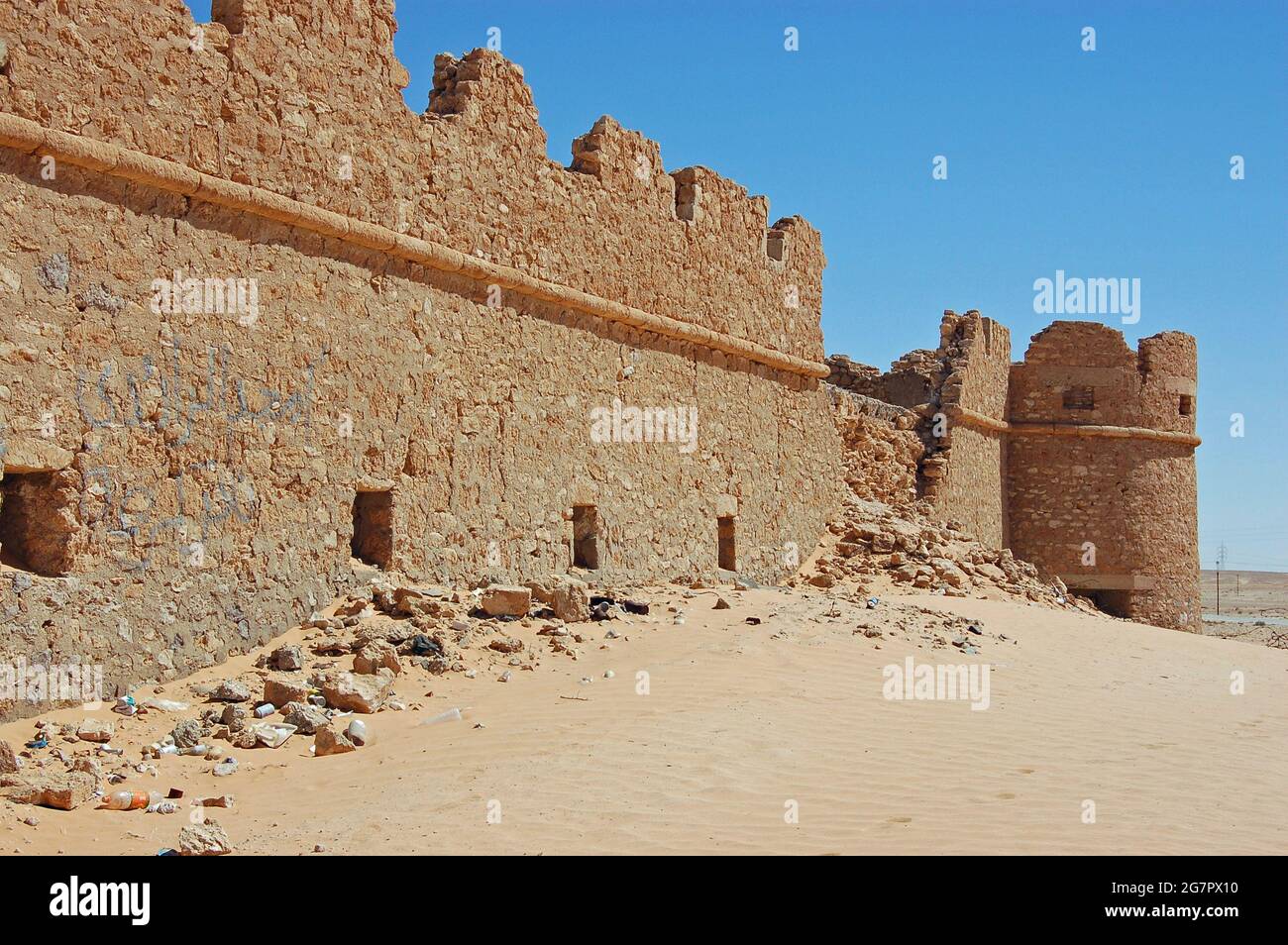 Stone wall and tower at the historic castle at Abu Nujaym in the ...