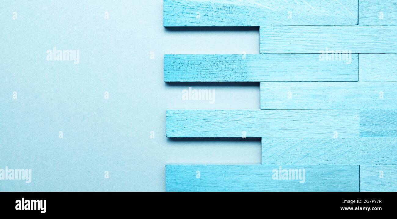 Solid wood parquet in blueas wood texture on blue background with space ...