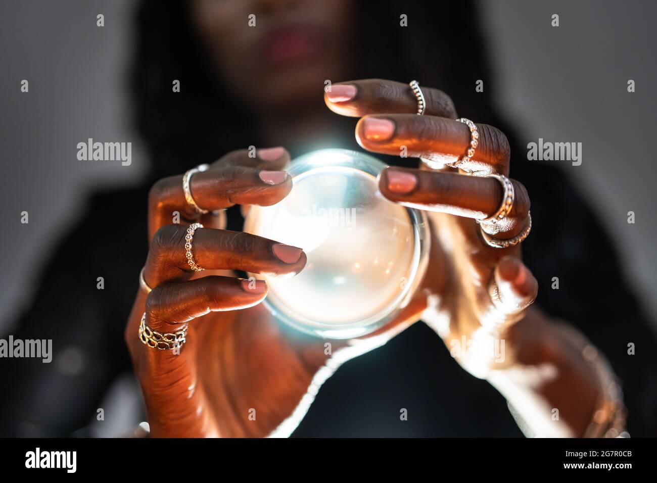 Fortune Teller Predicting Future Using Crystal Ball Stock Photo - Alamy